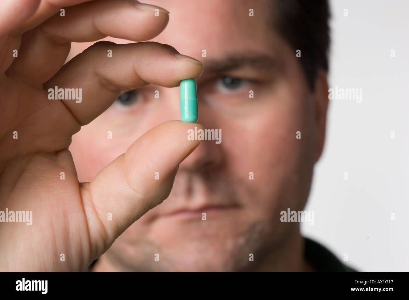 Hand male caucasian hold holding pill medicine prescription hi-res ...