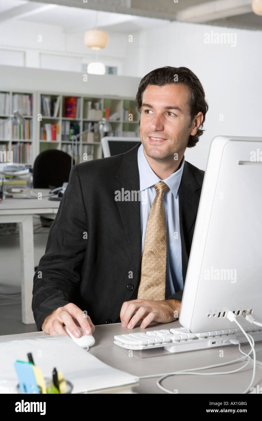 Person using computer in office hi-res stock photography and images - Alamy