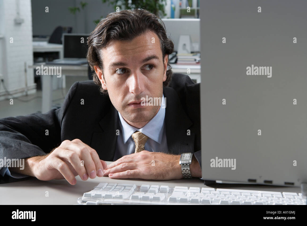 Businessman Hiding Behind Computer Monitor High Resolution Stock ...
