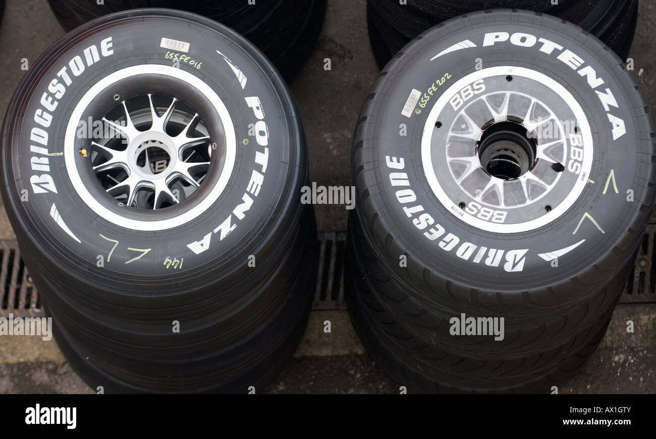 stacks of Bridgestone Formula 1 tires Stock Photo - Alamy