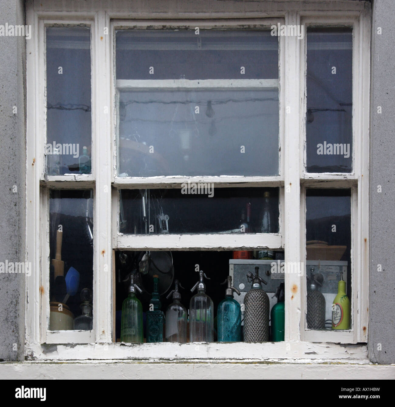 Cluttered window, St Ives, South Cornwall, UK Stock Photo - Alamy