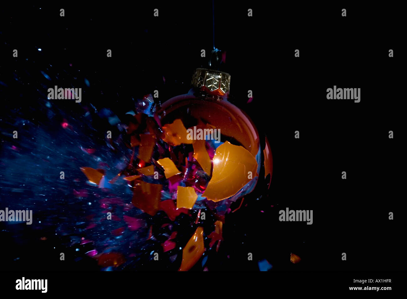 An exploding Christmas bauble Stock Photo - Alamy