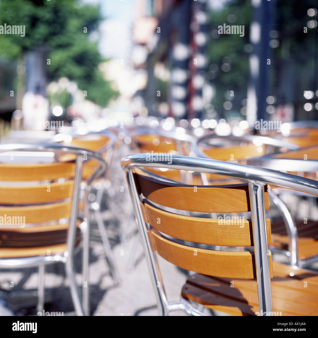 Seating at outdoor cafe Stock Photo - Alamy