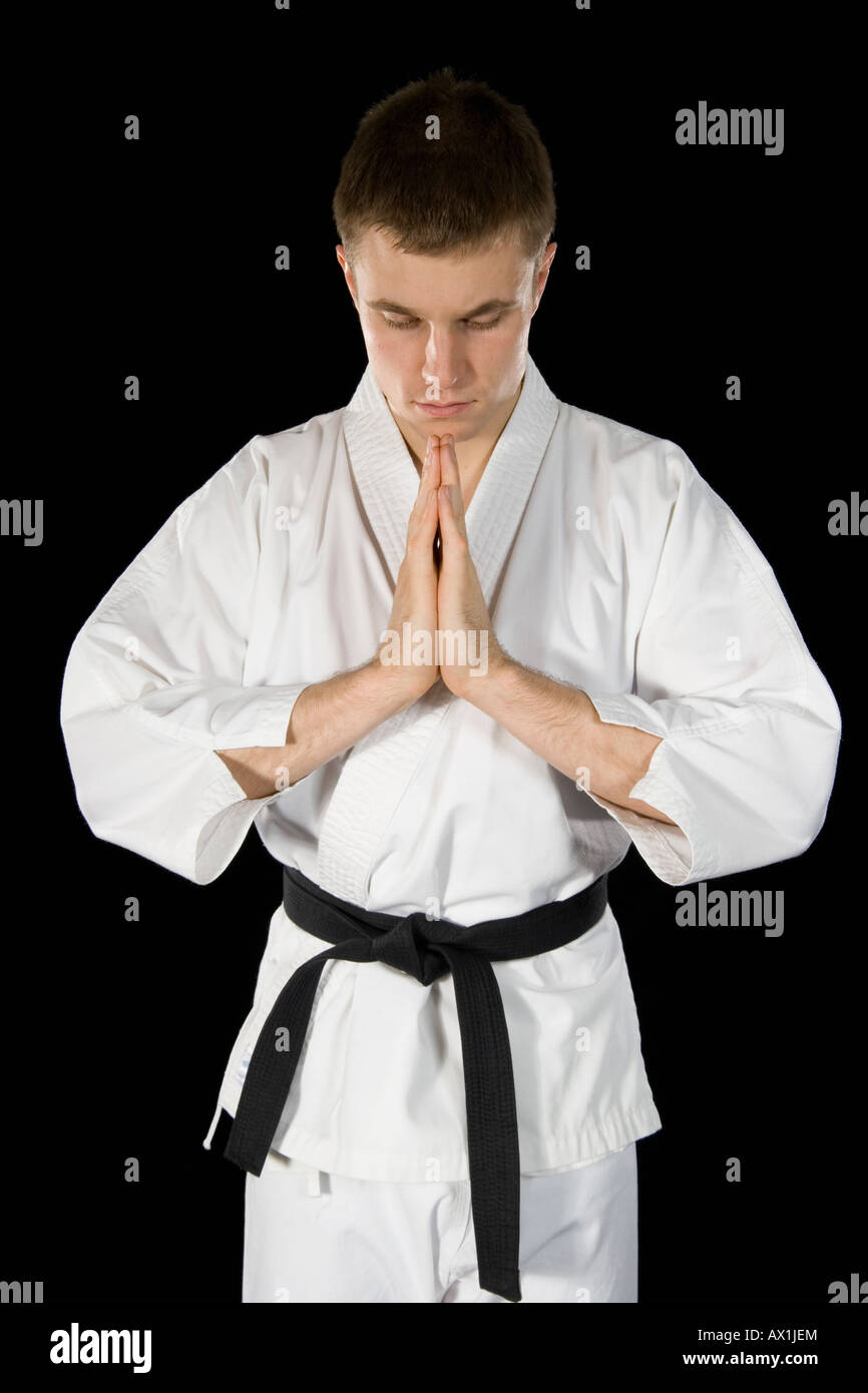A young man practicing karate Stock Photo - Alamy