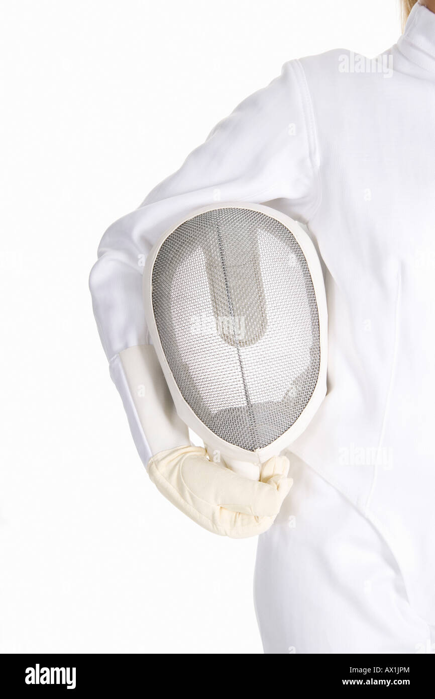 Studio shot of a female fencer holding a fencing mask Stock Photo - Alamy