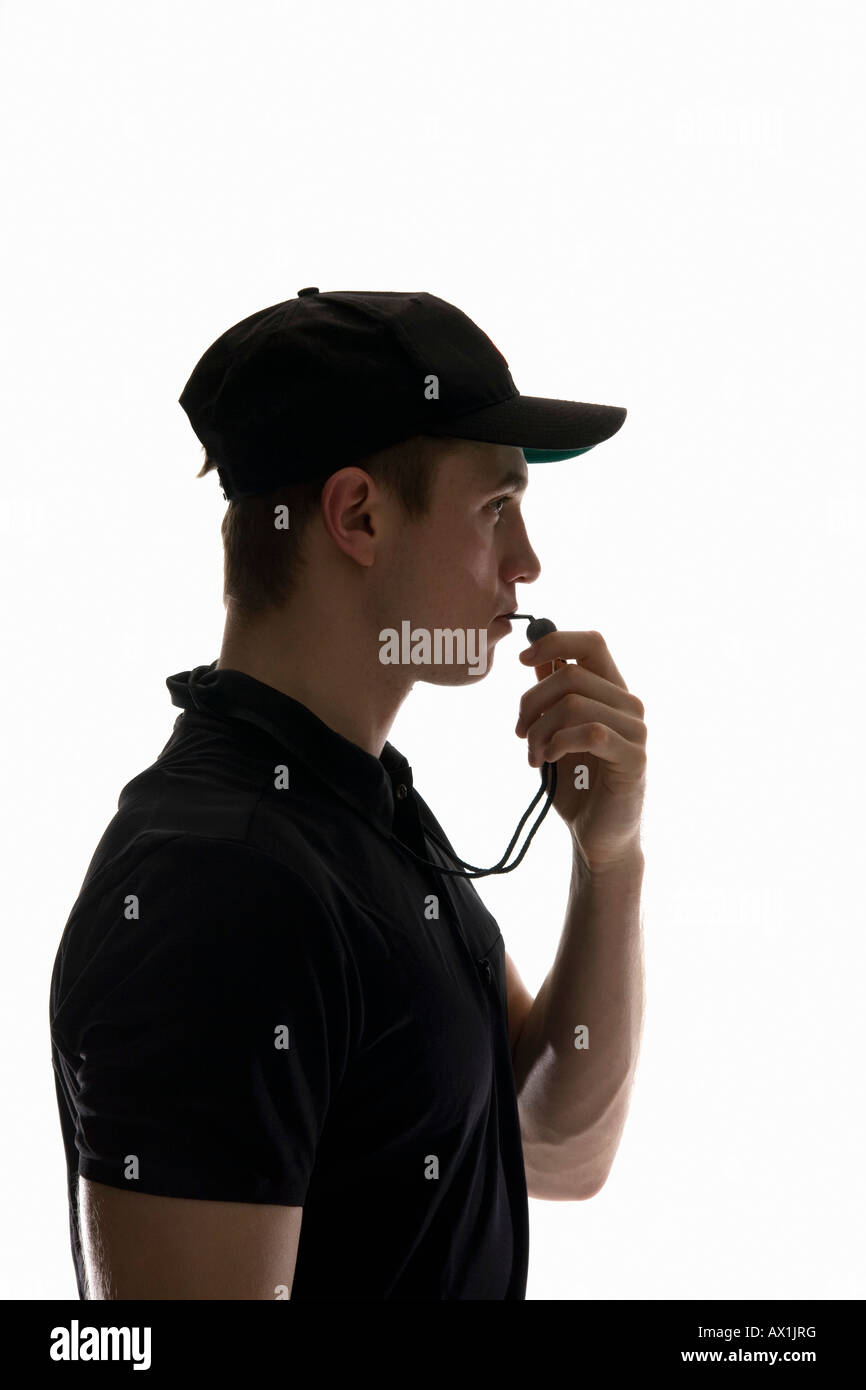 Close up referee blowing whistle hi-res stock photography and images ...