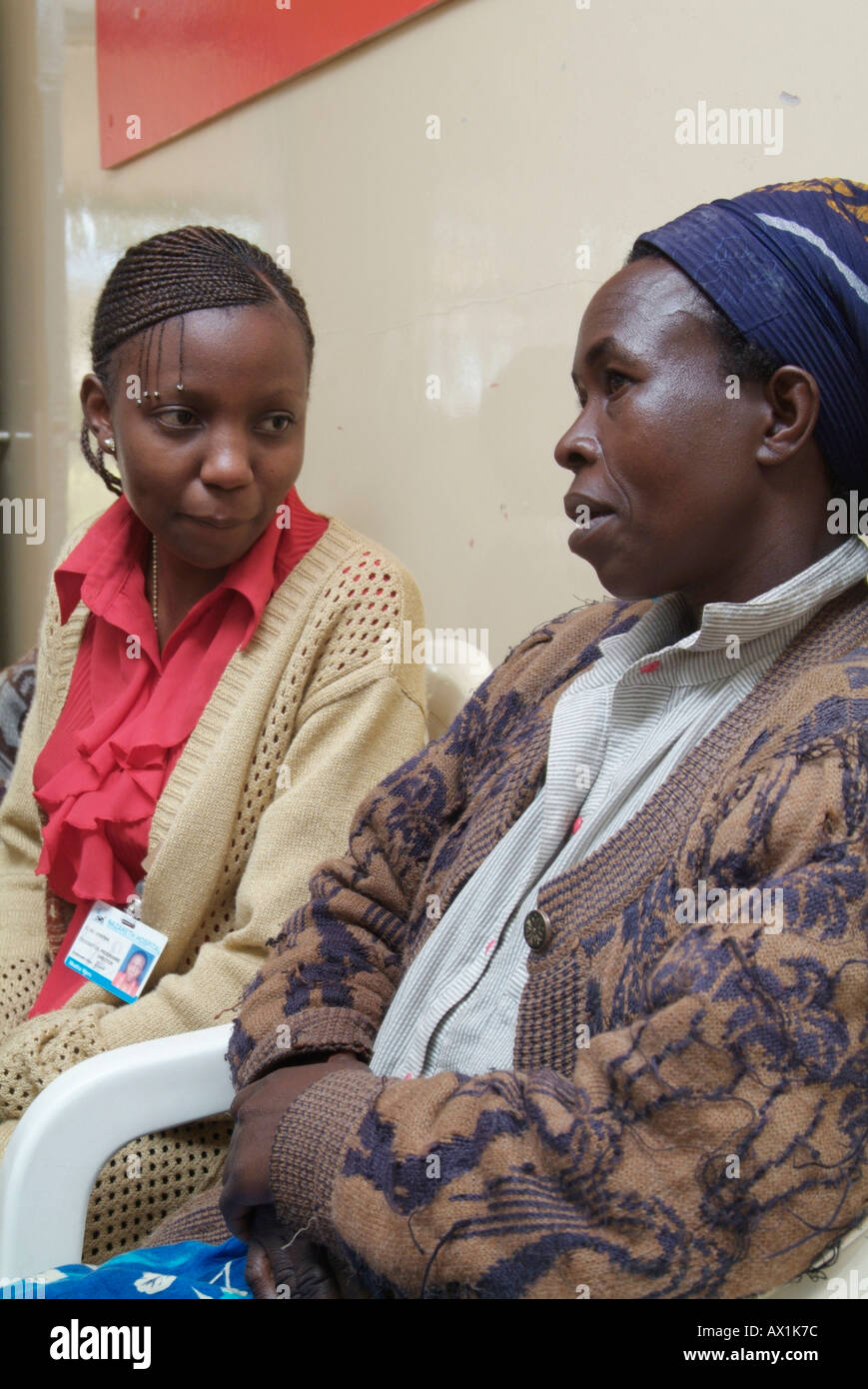 Doctor Aids patient Stock Photo - Alamy