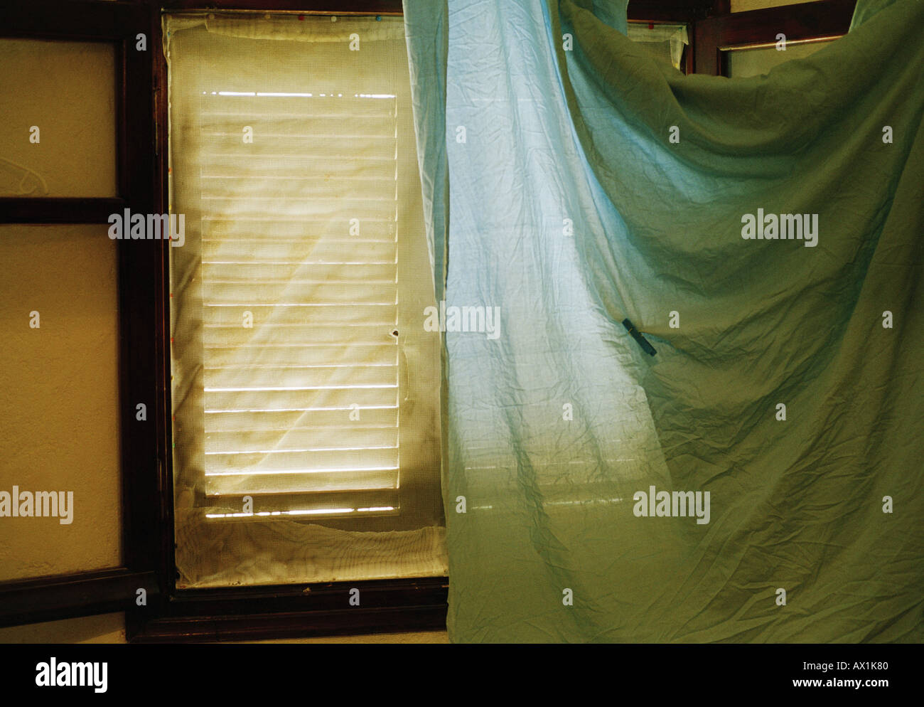 Cloth draped over windows Stock Photo - Alamy