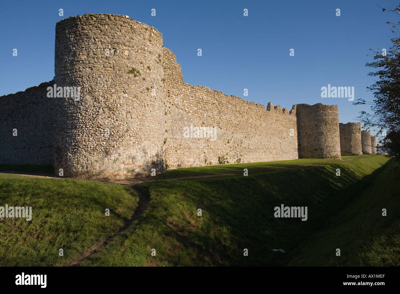 Roman walls of Portchester Castle, Hampshire, UK Stock Photo - Alamy