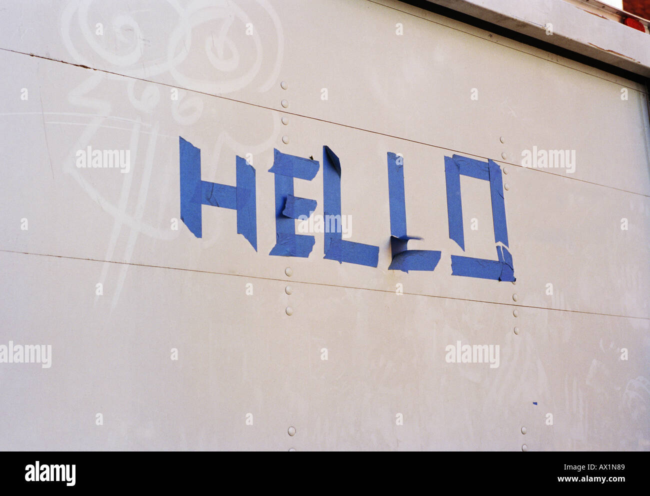 Hello in adhesive tape on a wall Stock Photo - Alamy