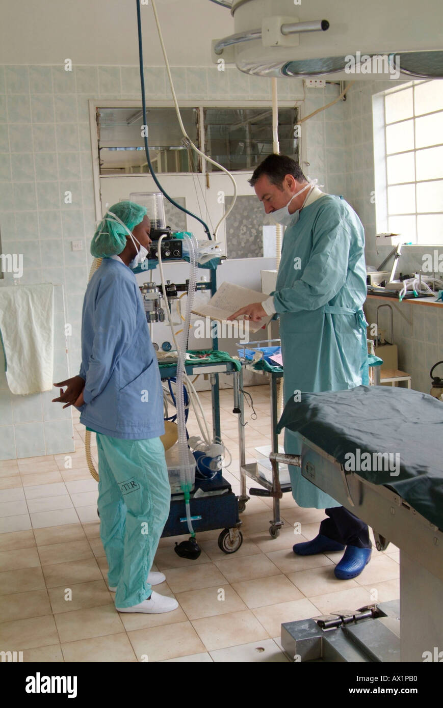Surgeon and nurse post op Stock Photo - Alamy