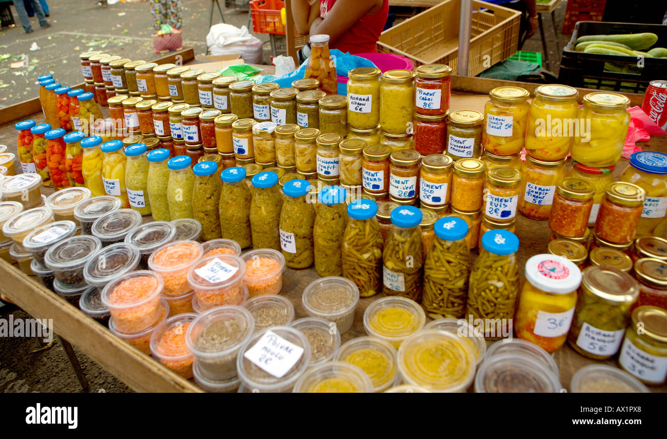 Rows of Achard pickles and spices for sale Chaudron Market Staint-Denis ...