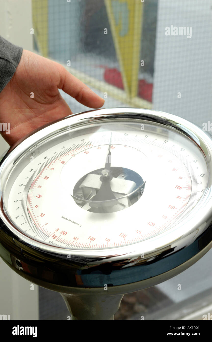 Patient on scales Stock Photo - Alamy