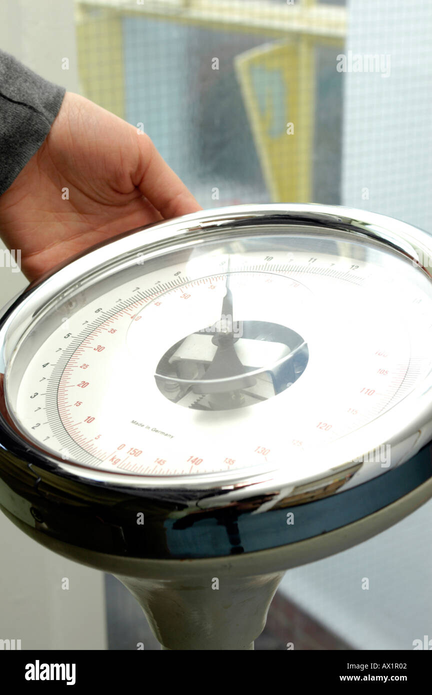 Patient on scales Stock Photo - Alamy