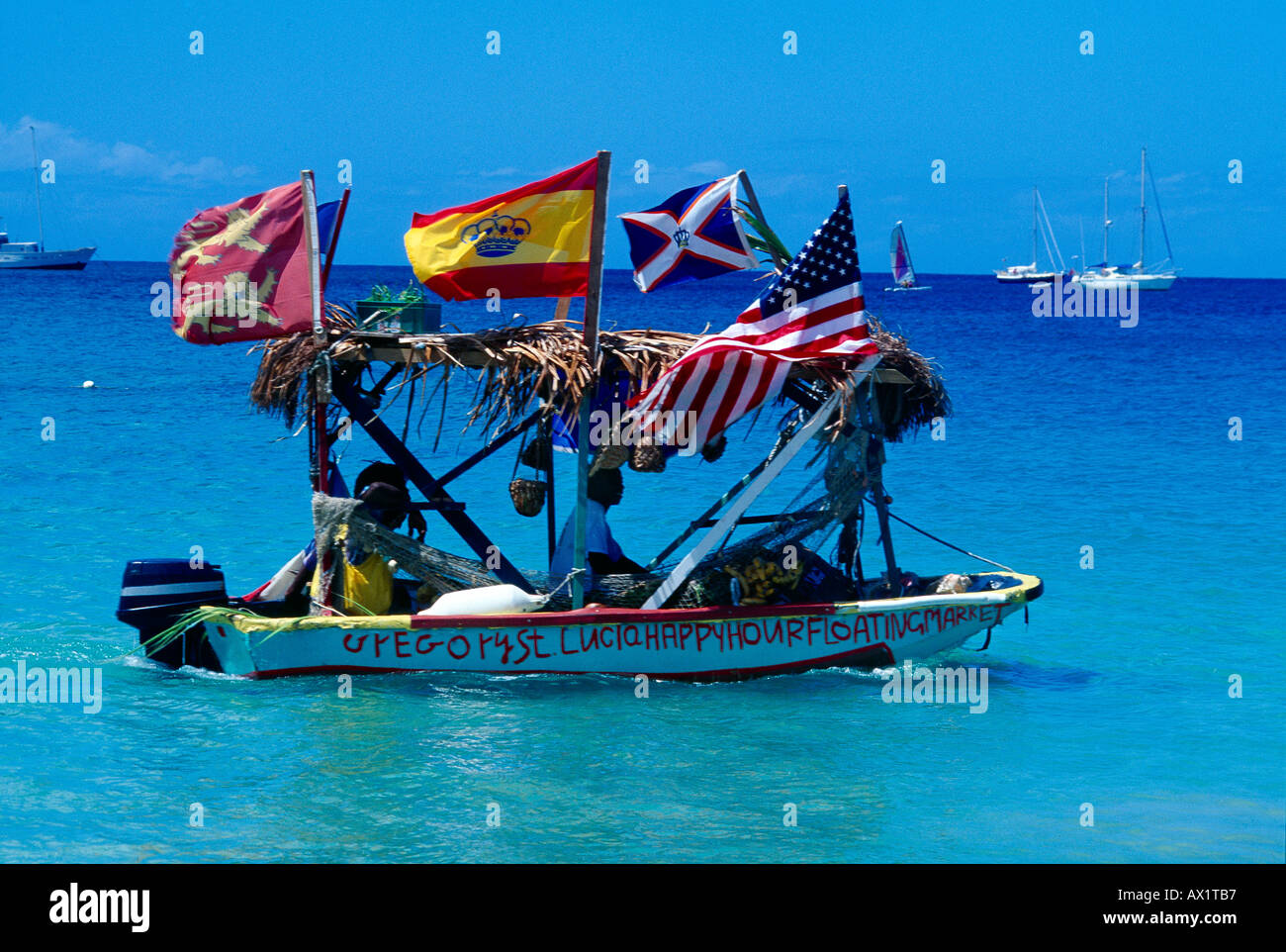 Rodney Bay St Lucia Reduit Beach Salesman In Boat Stock Photo - Alamy