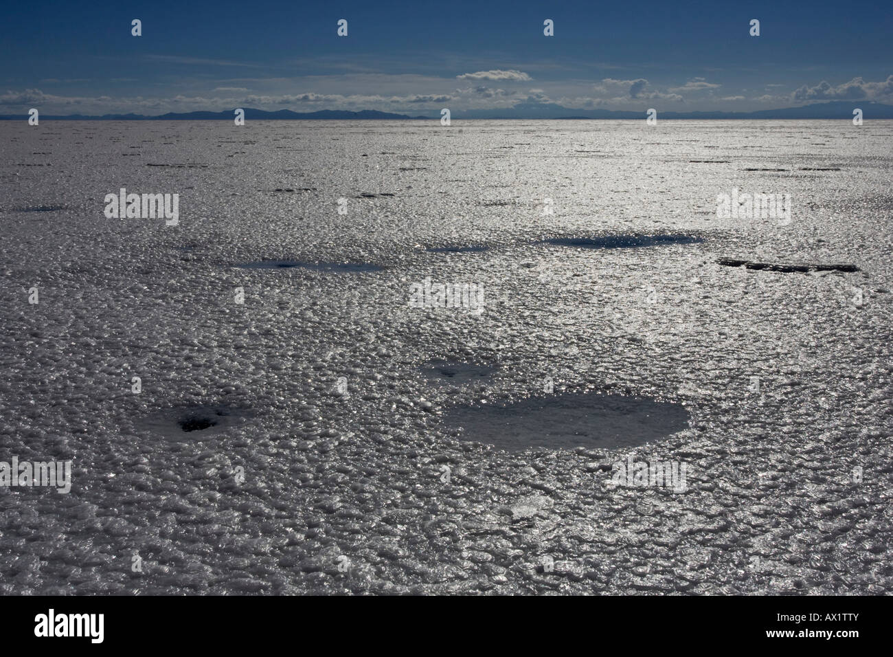 Salt lake Salar de Uyuni in back light, Altiplano, Bolivia, South ...