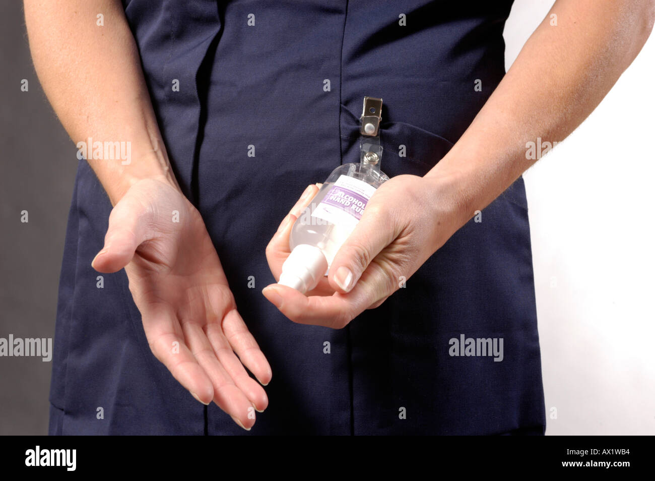 Nurse with alcohol hand rub Stock Photo - Alamy