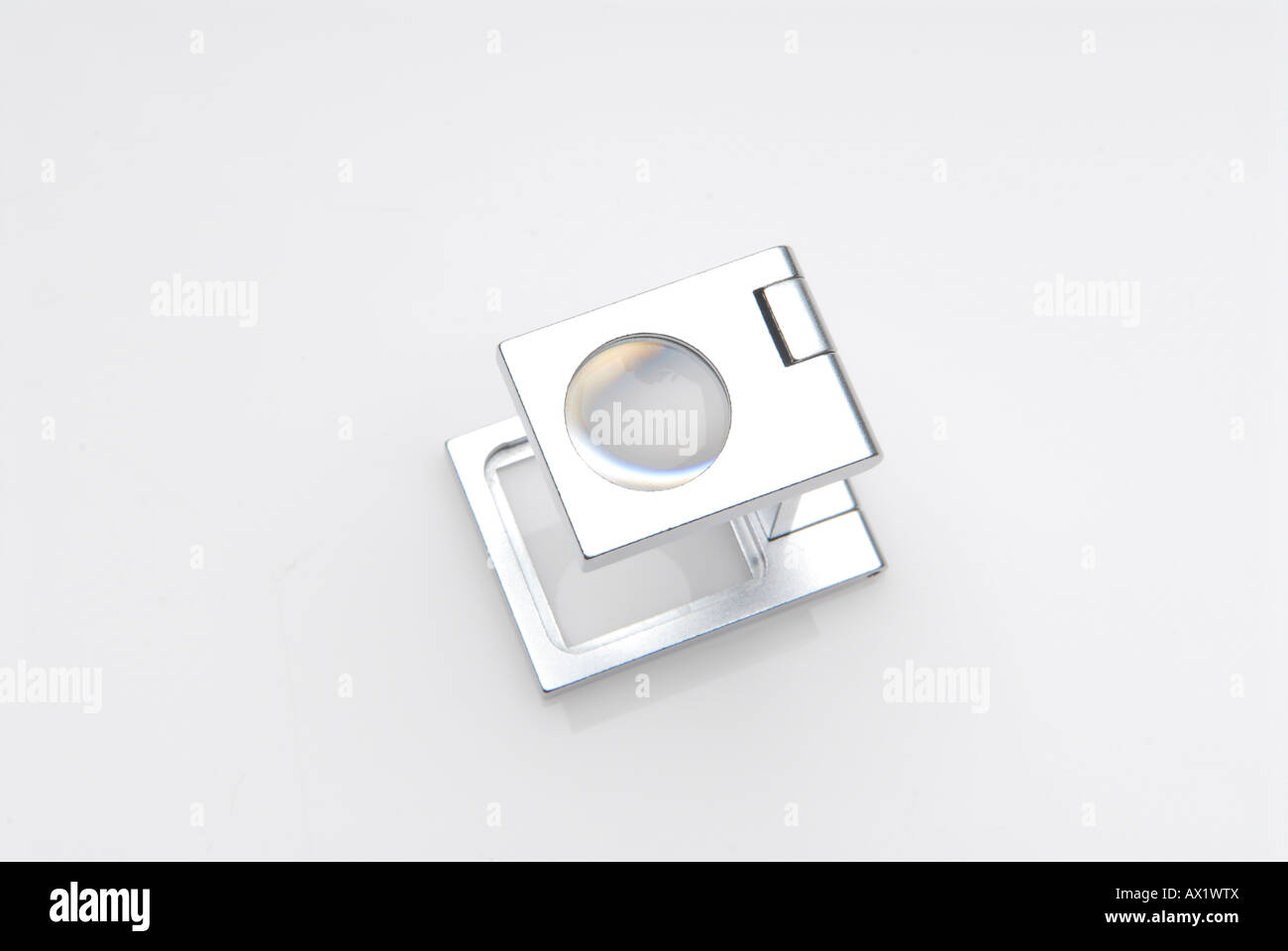 Magnifying glass, linen tester Stock Photo - Alamy