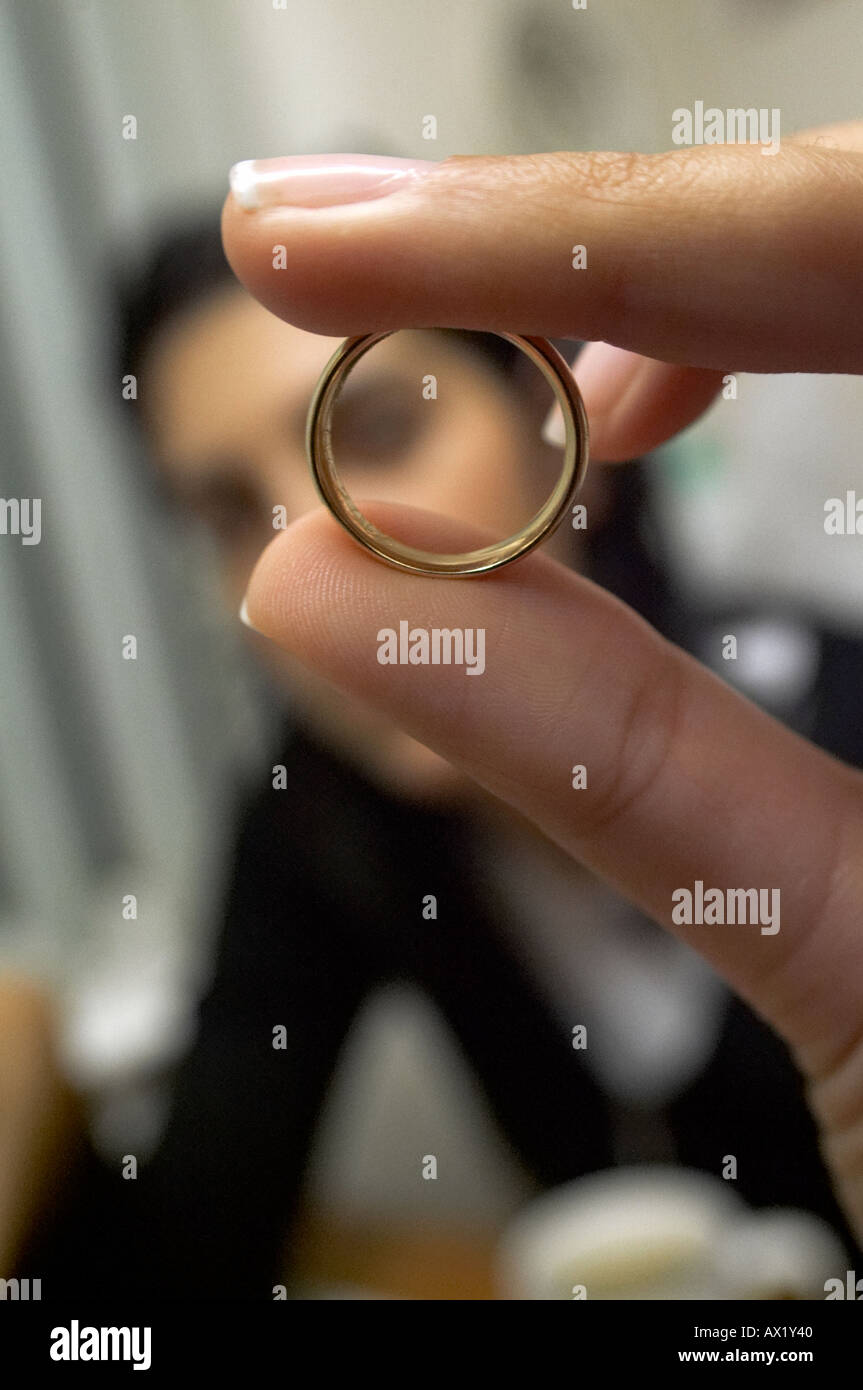 Young lady showing off wedding ring Stock Photo - Alamy