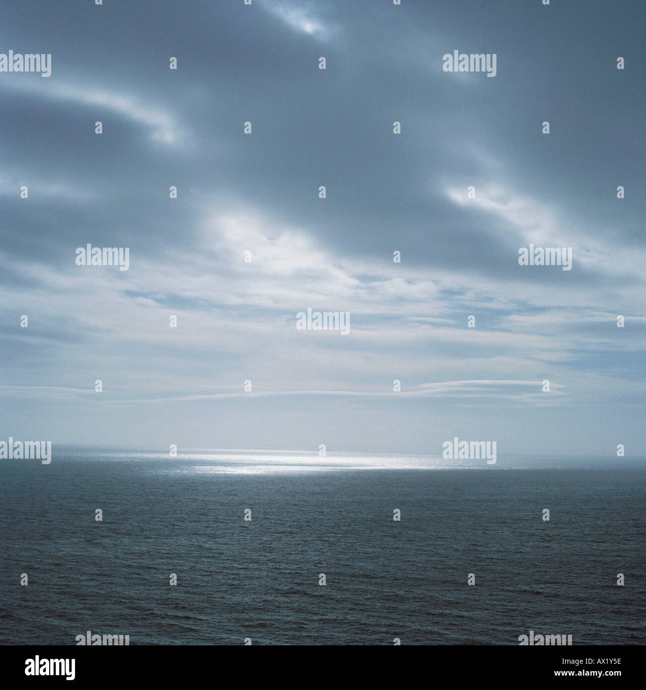 Dark clouds over the ocean hi-res stock photography and images - Alamy