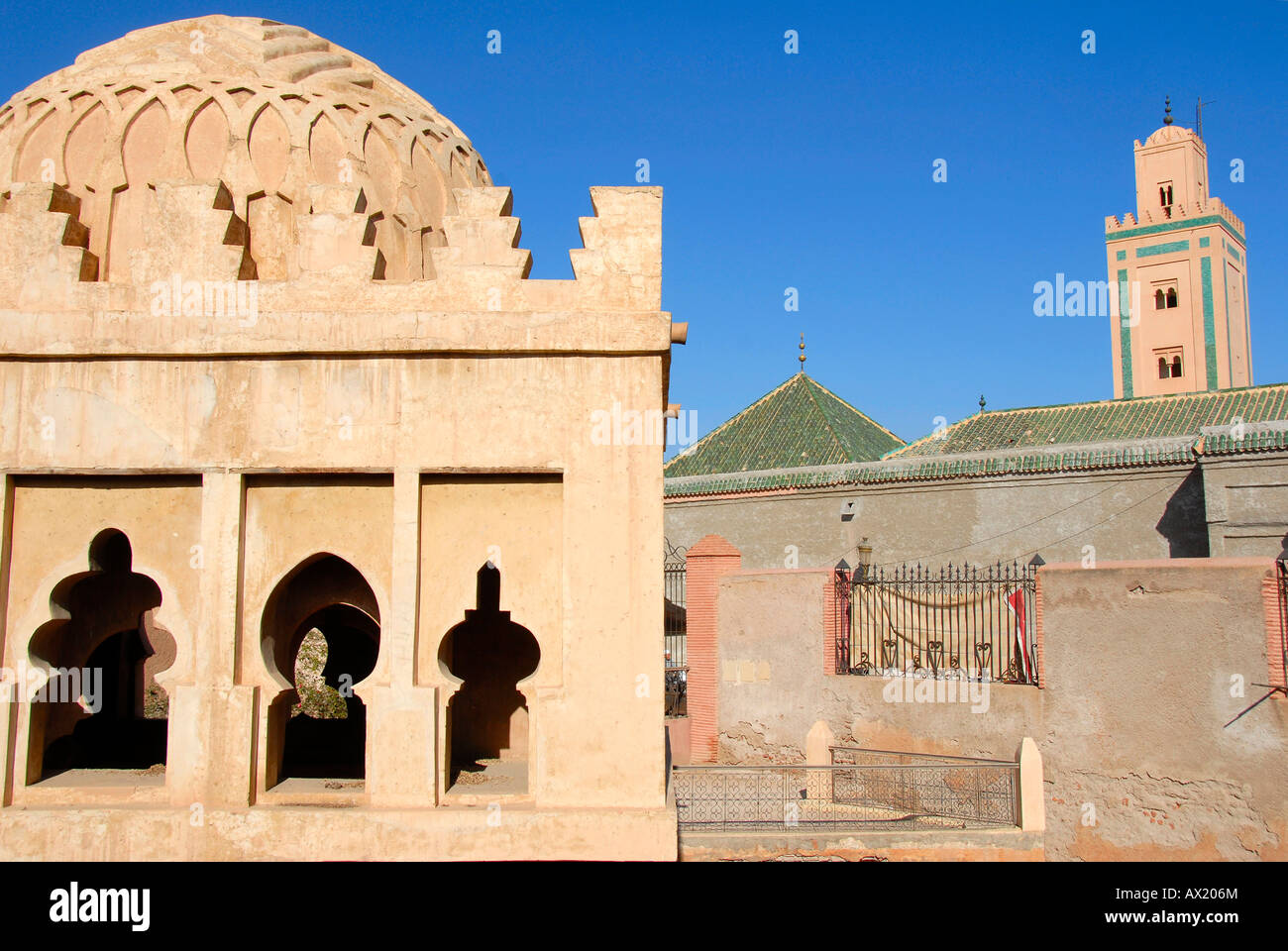 Ancient Berber decorated cupola building Koubba Ba'adyin with minaret ...