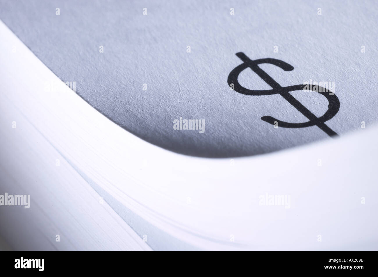 Dollar sign on curved paper Stock Photo - Alamy