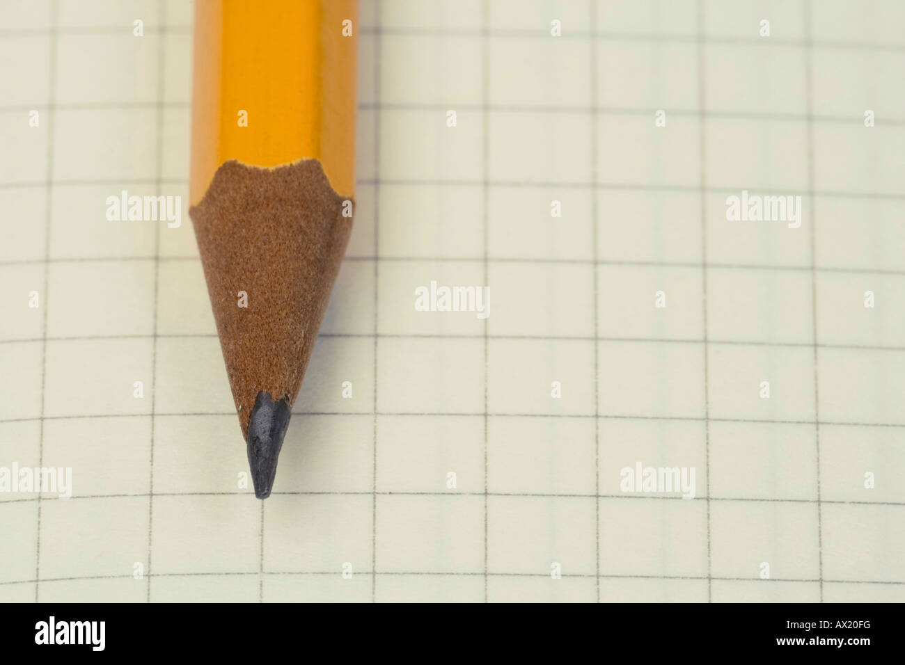 Graph paper with pencil Stock Photo - Alamy