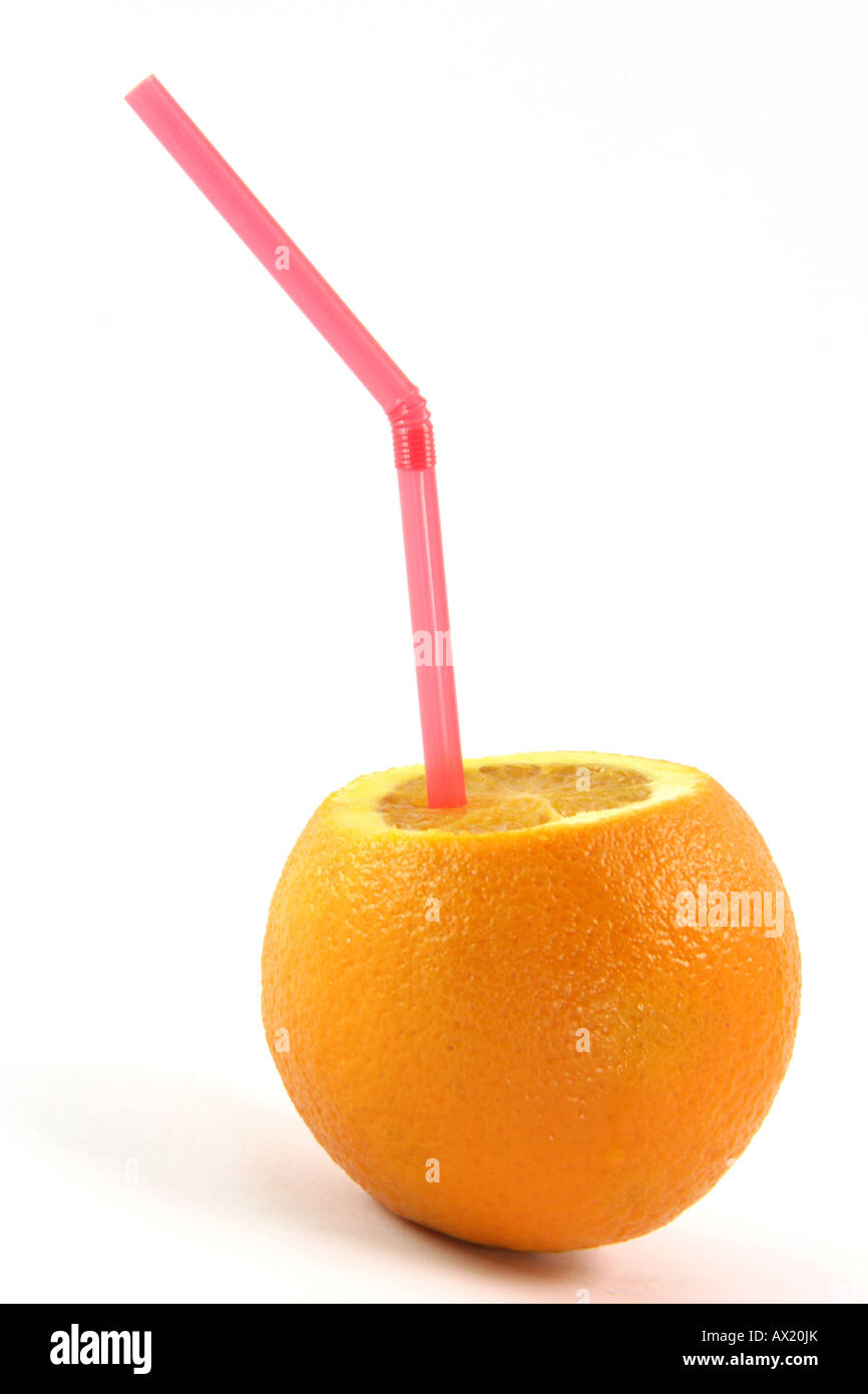 orange with straw inside isolated on white background Stock Photo - Alamy