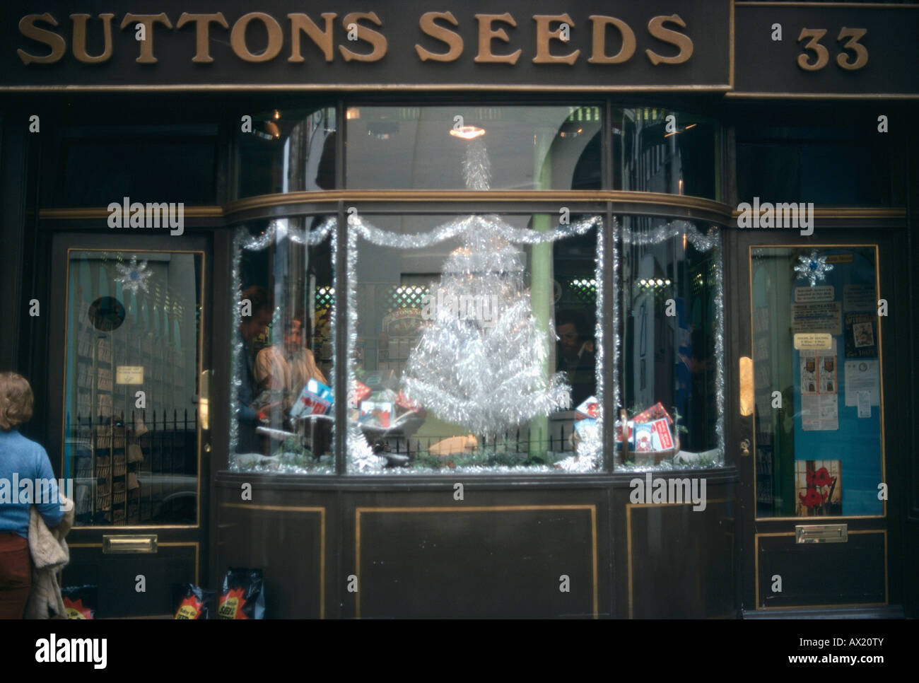 Sutton's Seeds sign above window of traditional shop front Stock Photo ...