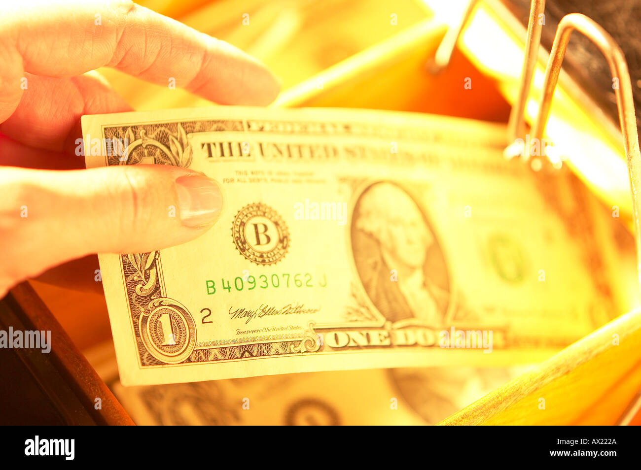 Hand in till hi-res stock photography and images - Alamy