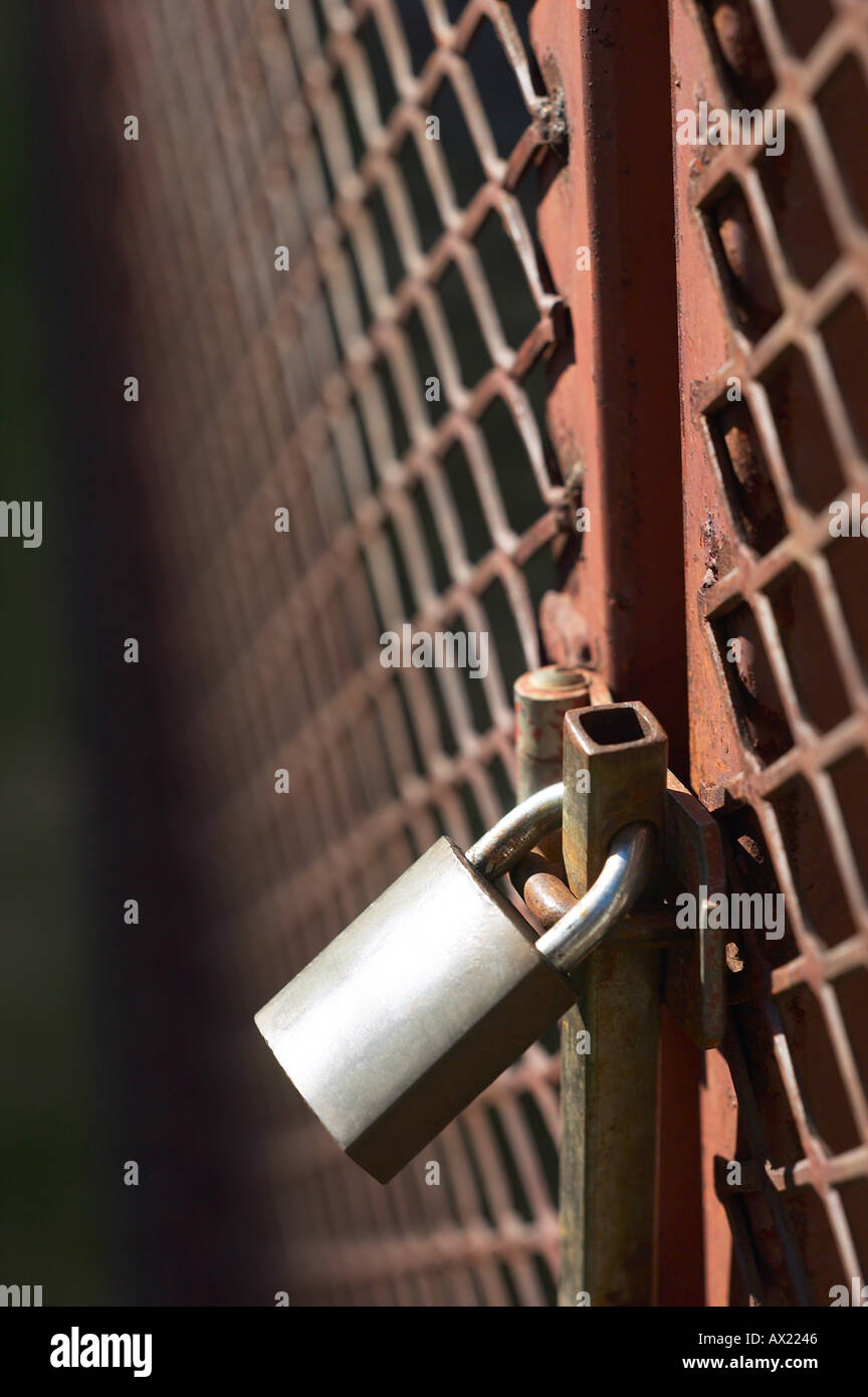 Rusty gate and lock Stock Photo - Alamy