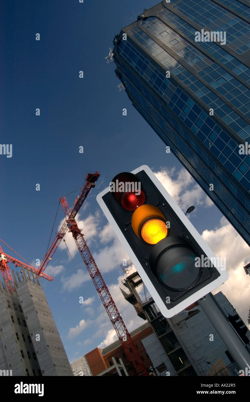 traffic lights in front of construction in birmingham uk against a deep ...