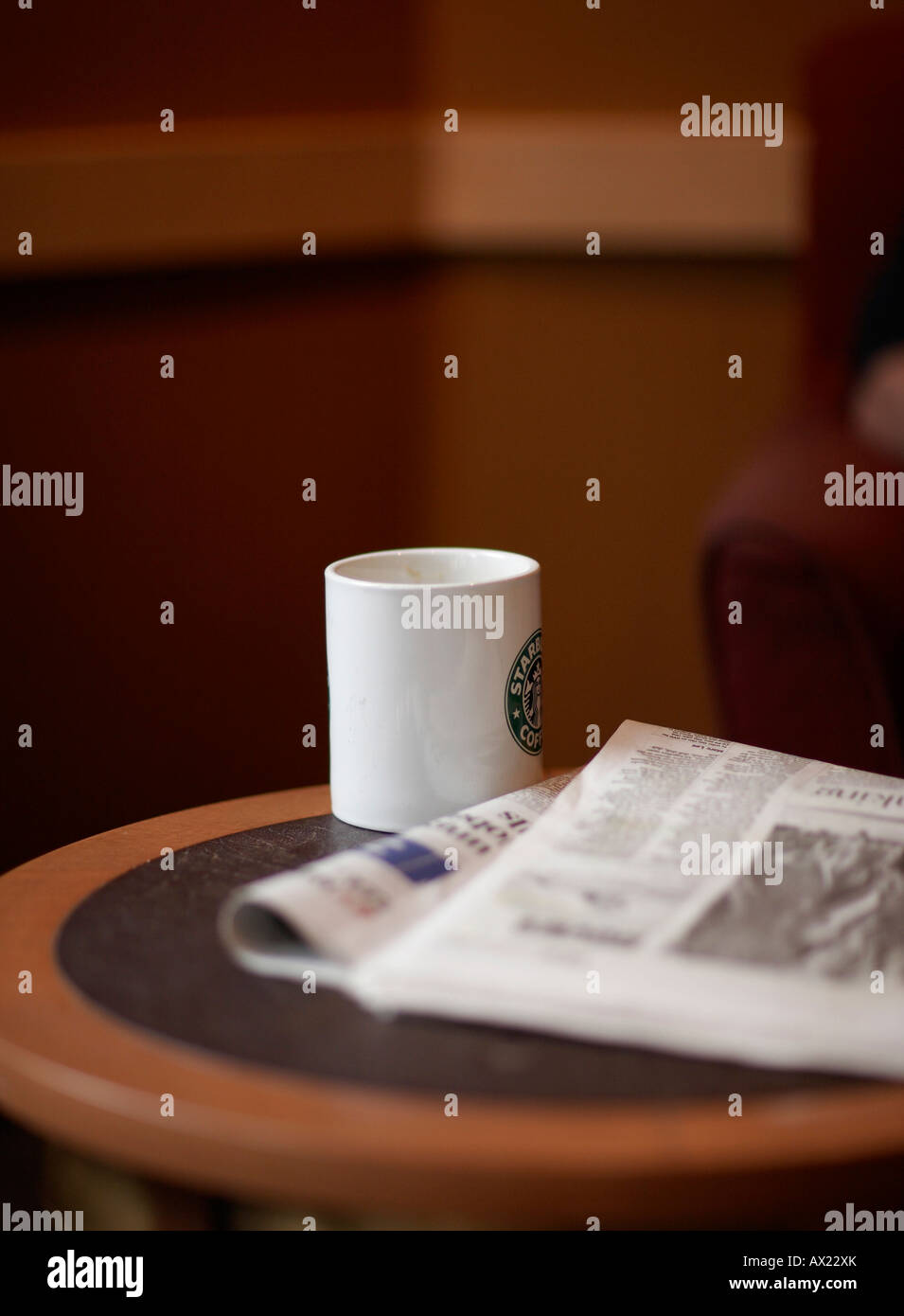 Single mug of coffee on a table in a coffee shop Stock Photo - Alamy