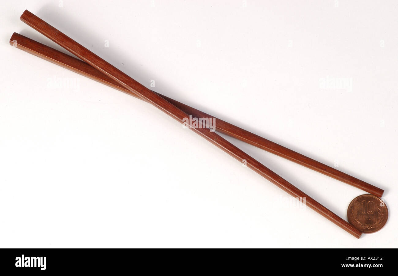 Chopsticks holding money hi-res stock photography and images - Alamy