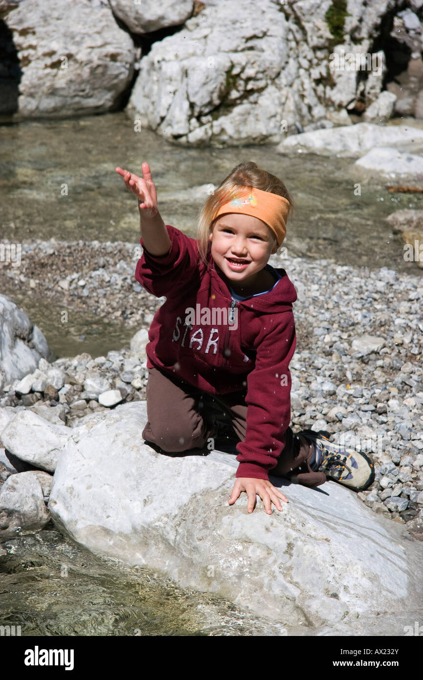 Playing in water streams hi-res stock photography and images - Alamy