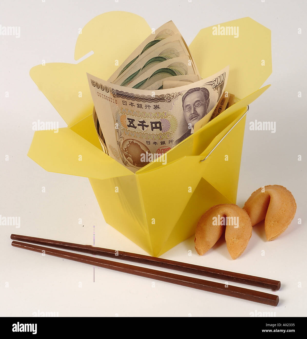 Money in take out box Stock Photo - Alamy