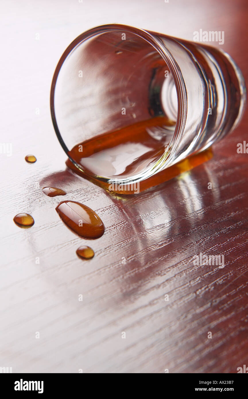 Overturned shot glass Stock Photo - Alamy