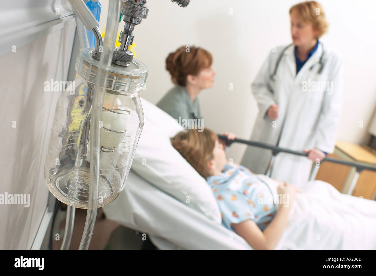 Patient in hospital bed an 2 Stock Photo - Alamy