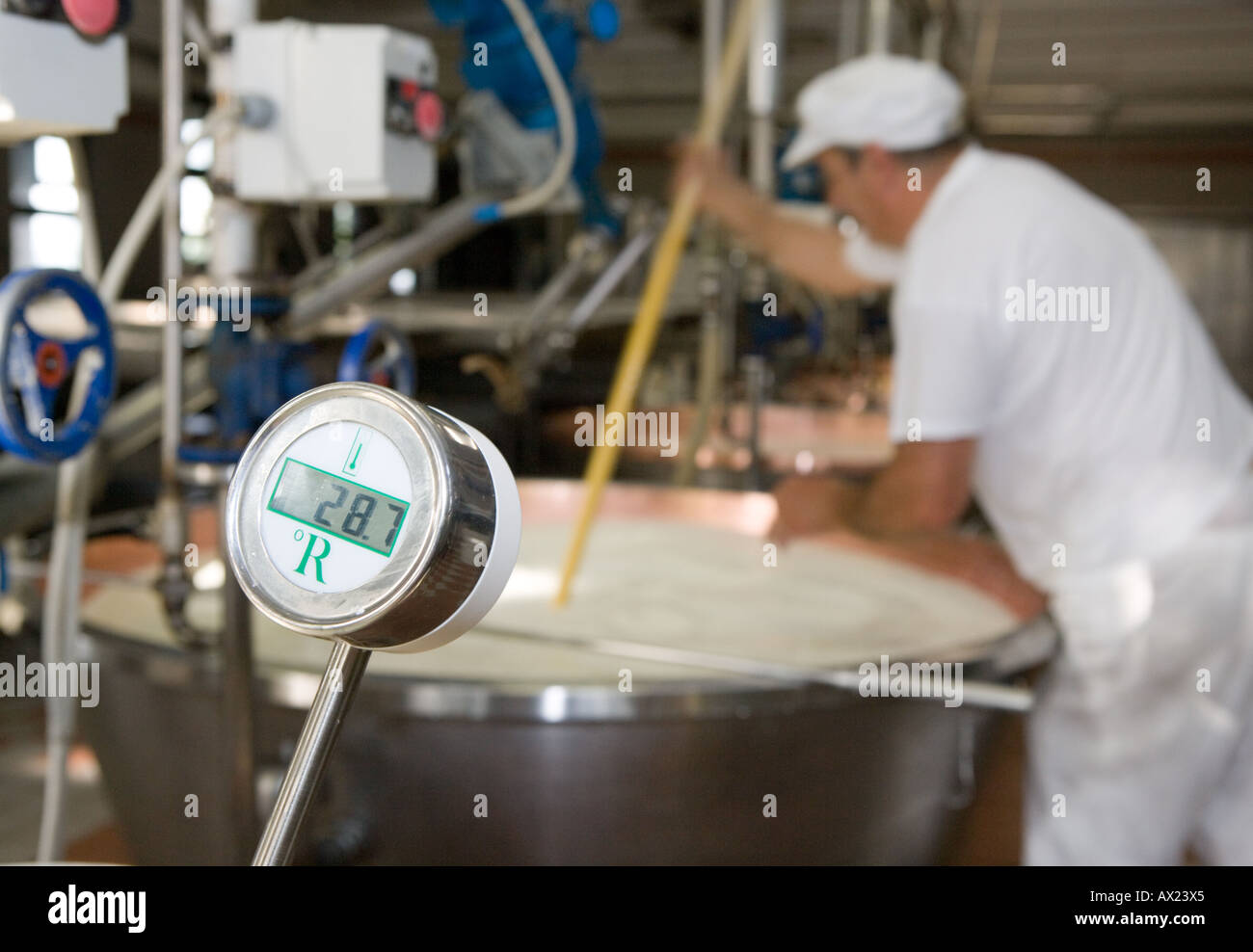 Making organic Parmesan Cheese Heating and agitating Italy Stock Photo ...