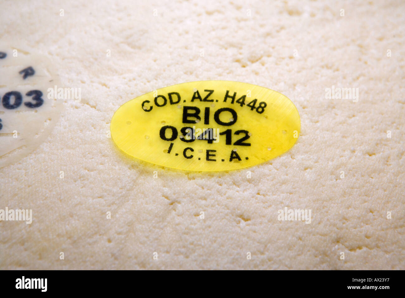 Organic label on a Parmesan cheese Stock Photo - Alamy