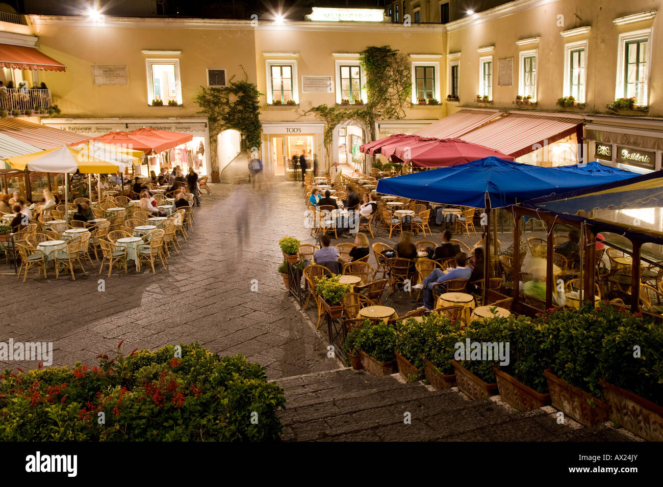 Piazza with restaurants and cafes in Capri at dusk Capri Italy Stock ...