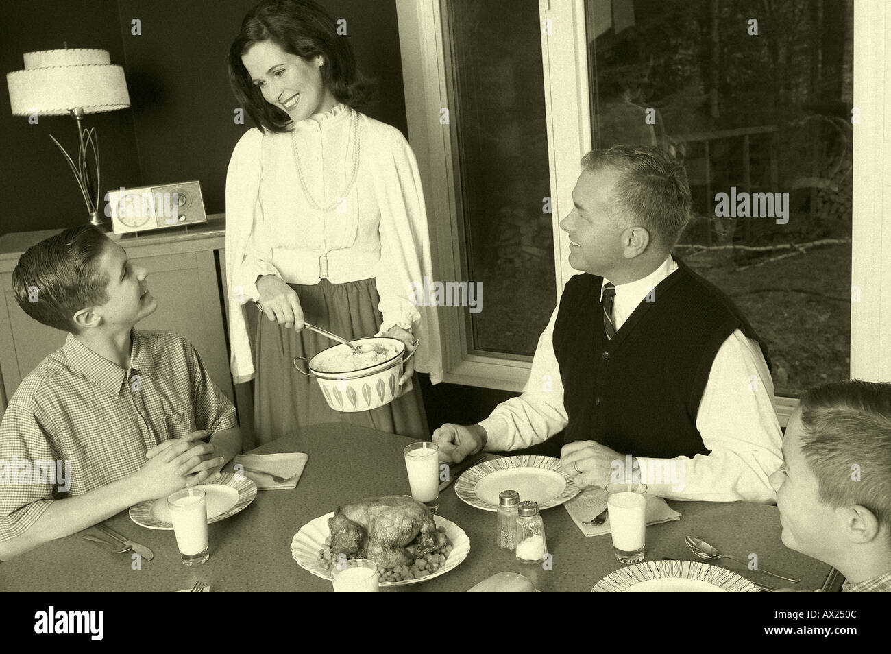 1950s family at dinner table uid 1426520 Stock Photo - Alamy