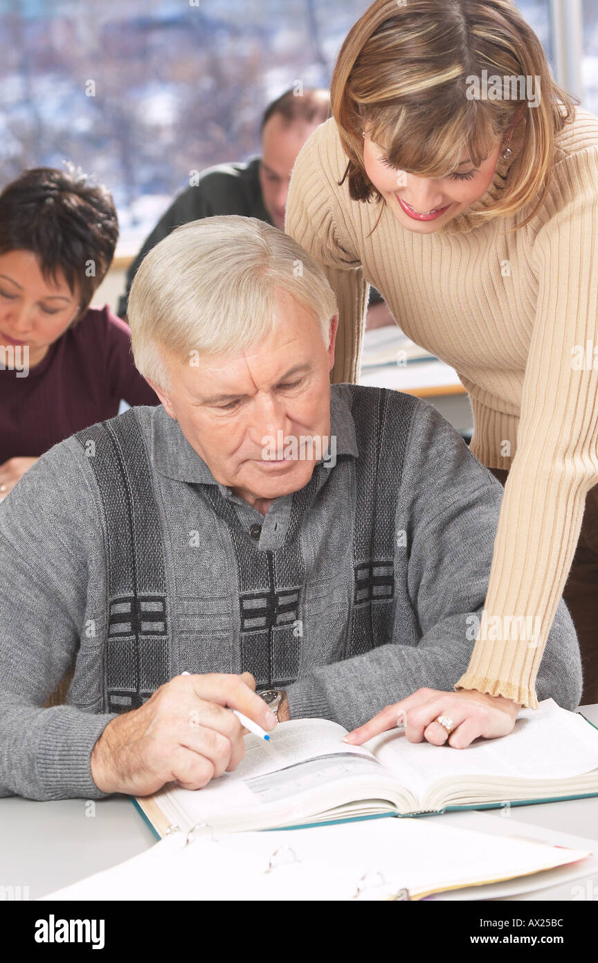 Adult literacy class and female student hi-res stock photography and ...