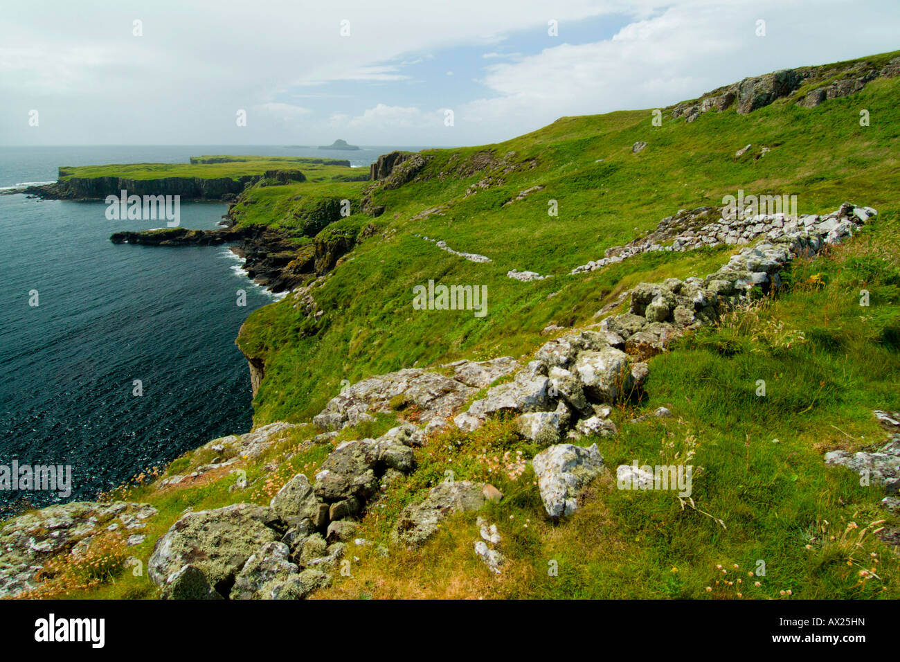 Stone wall along the coast, Lunga Island, Treshnish Isles, Scotland, UK ...