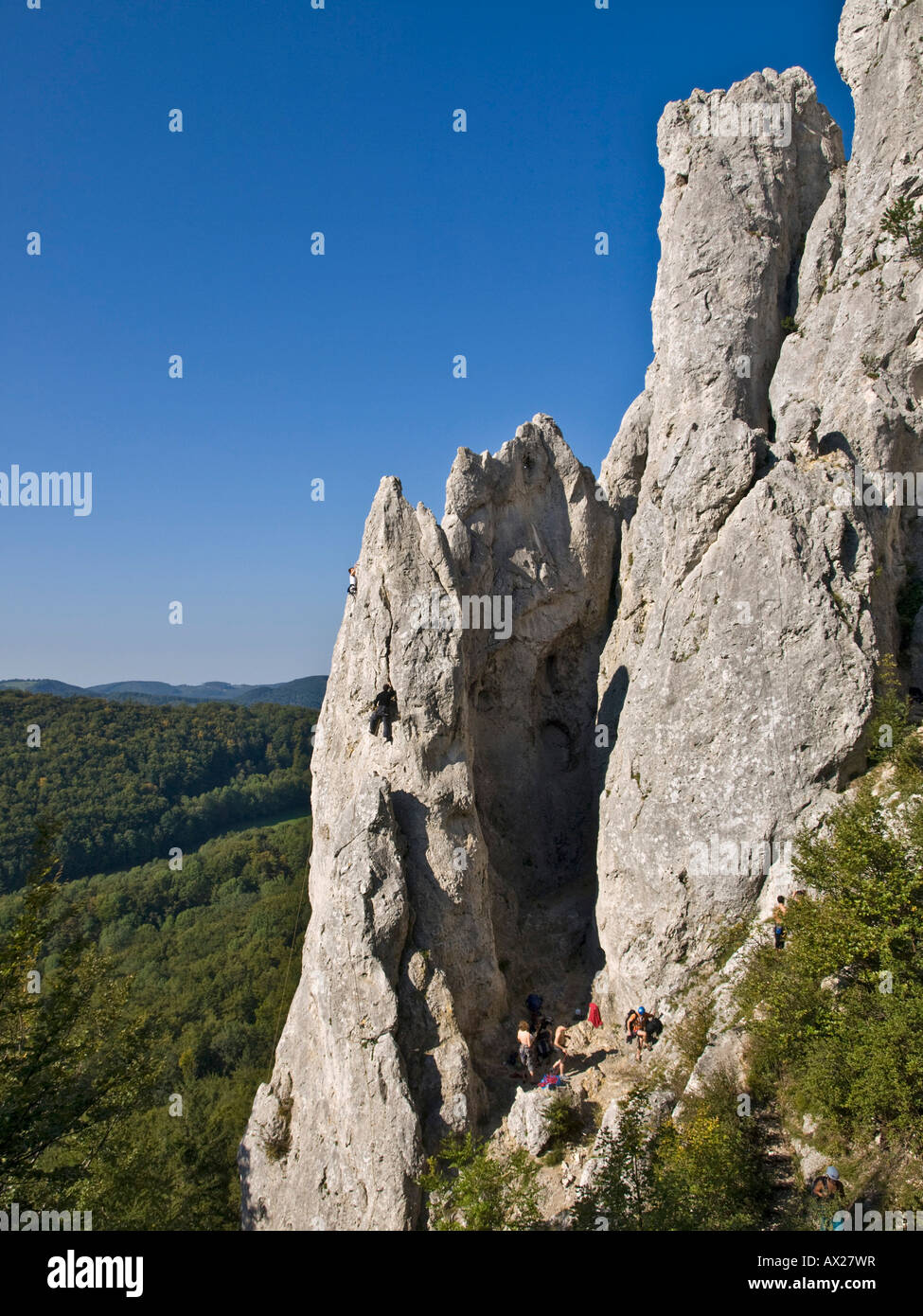 Rock-climbers climbing the rock face of Mt. Peilstein, Lower Austria ...