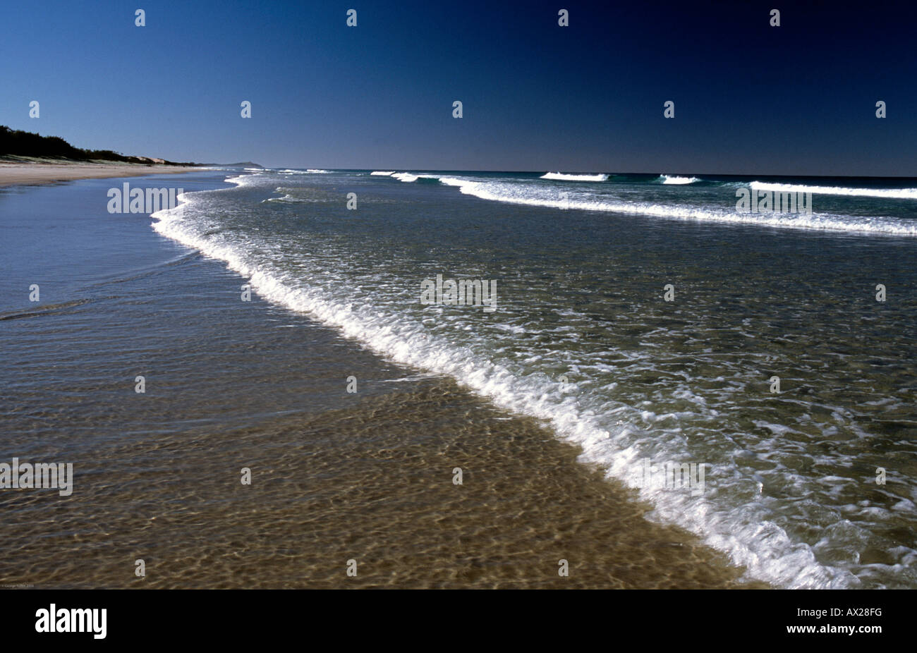 waves along the shoreline Stock Photo - Alamy