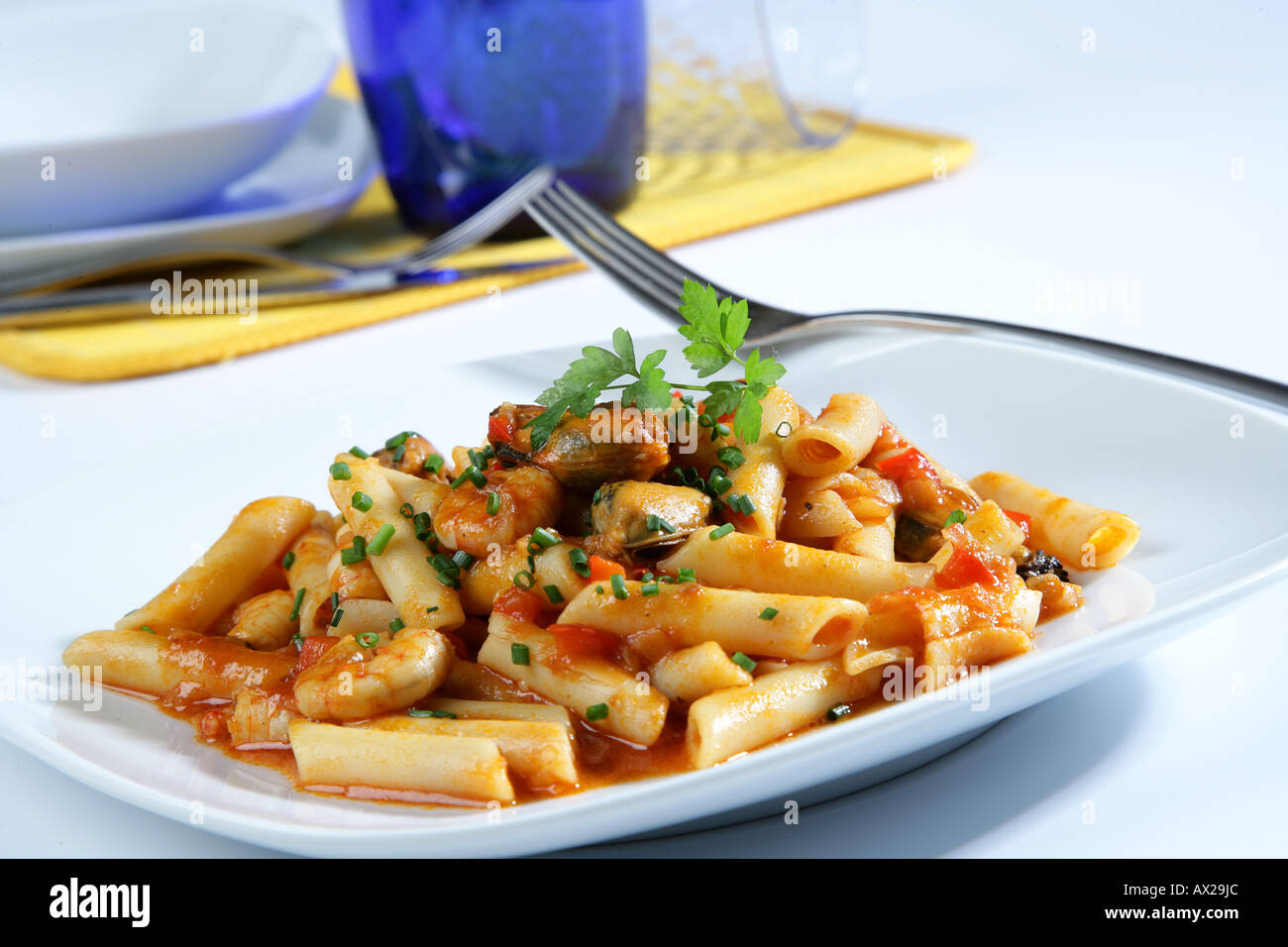 Penne with fish and seafood Stock Photo - Alamy