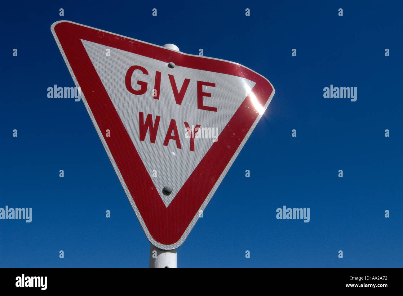 Give way sign Stock Photo - Alamy