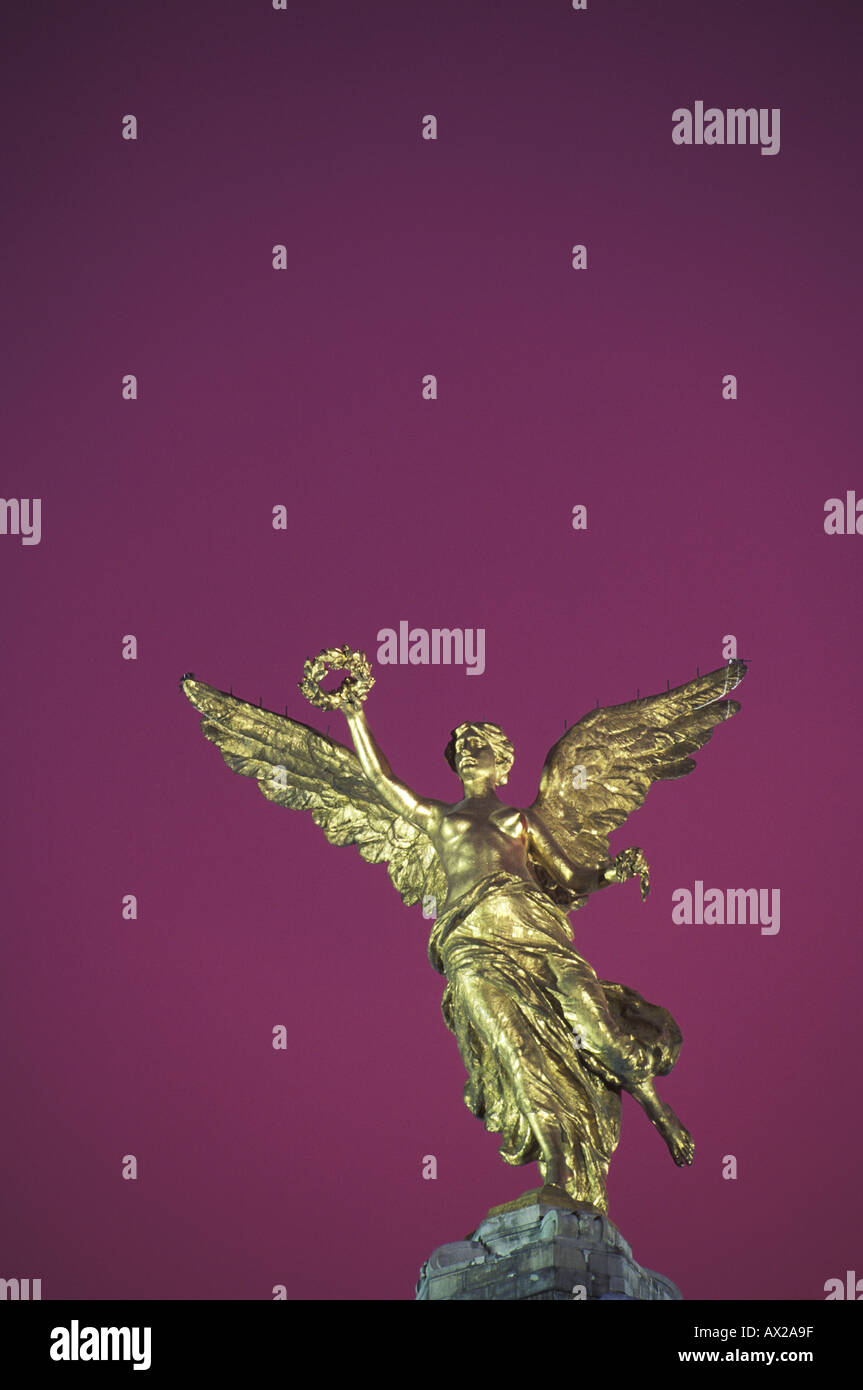 Mexico City angel statue in atop monument Stock Photo - Alamy