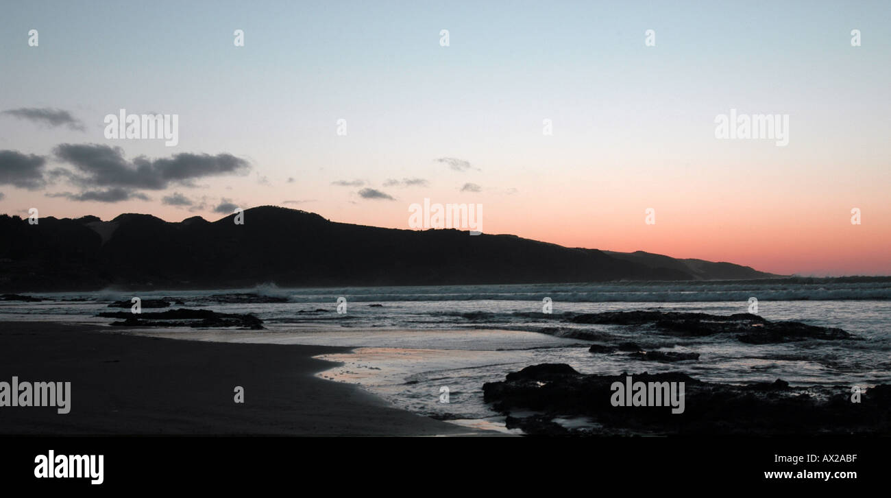 Sunset 90 mile beach Ahipara New Zealand Stock Photo - Alamy
